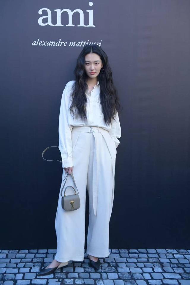 Miriam Yang in a blue suit with bright hair, Xu Guanghan and Yu ...